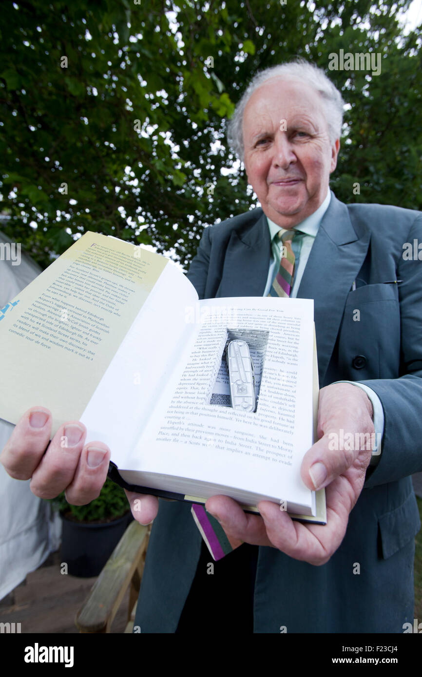 Alexander McCall Smith with his Scotland Street book, featuring a ...