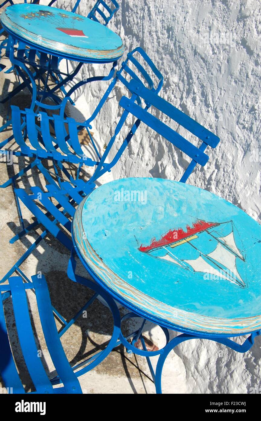 Blue tables chairs greece hi-res stock photography and images - Alamy
