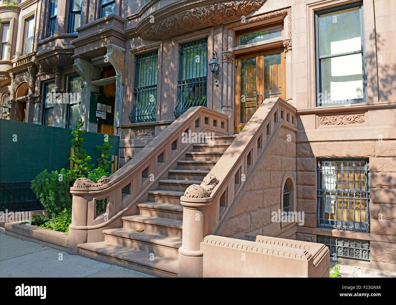 Brownstone apartment buildings, and staircase, New York Stock Photo - Alamy