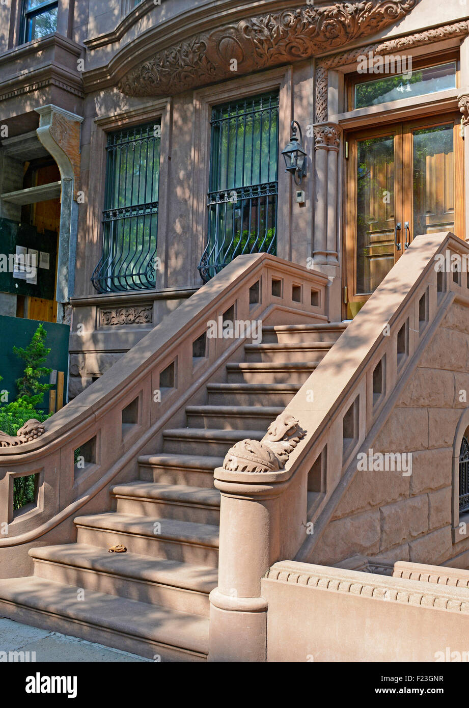 Brownstone apartment buildings, and staircase, New York Stock Photo - Alamy