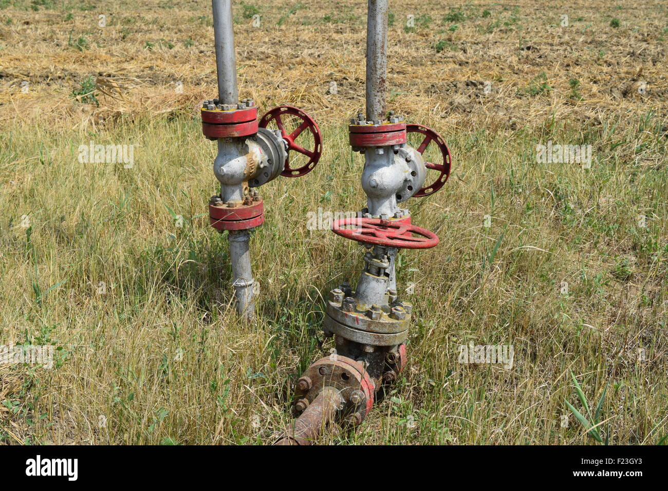 The gate on an oil well Stock Photo - Alamy