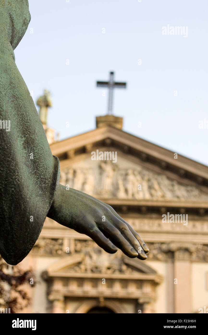 Hand of a bronze statue, Milan Stock Photo - Alamy