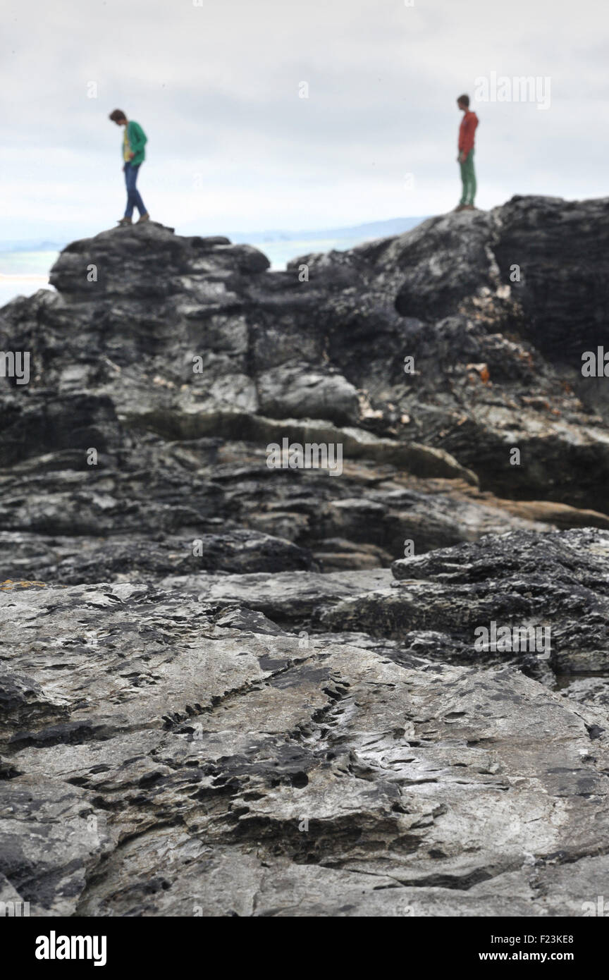 Children climbing rocks hi-res stock photography and images - Alamy