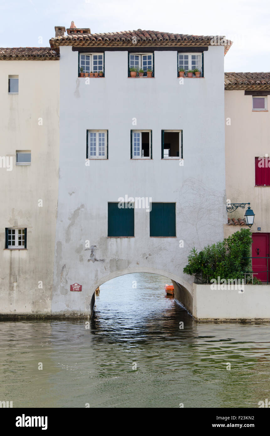 Frontage of buildings with canal Stock Photo - Alamy