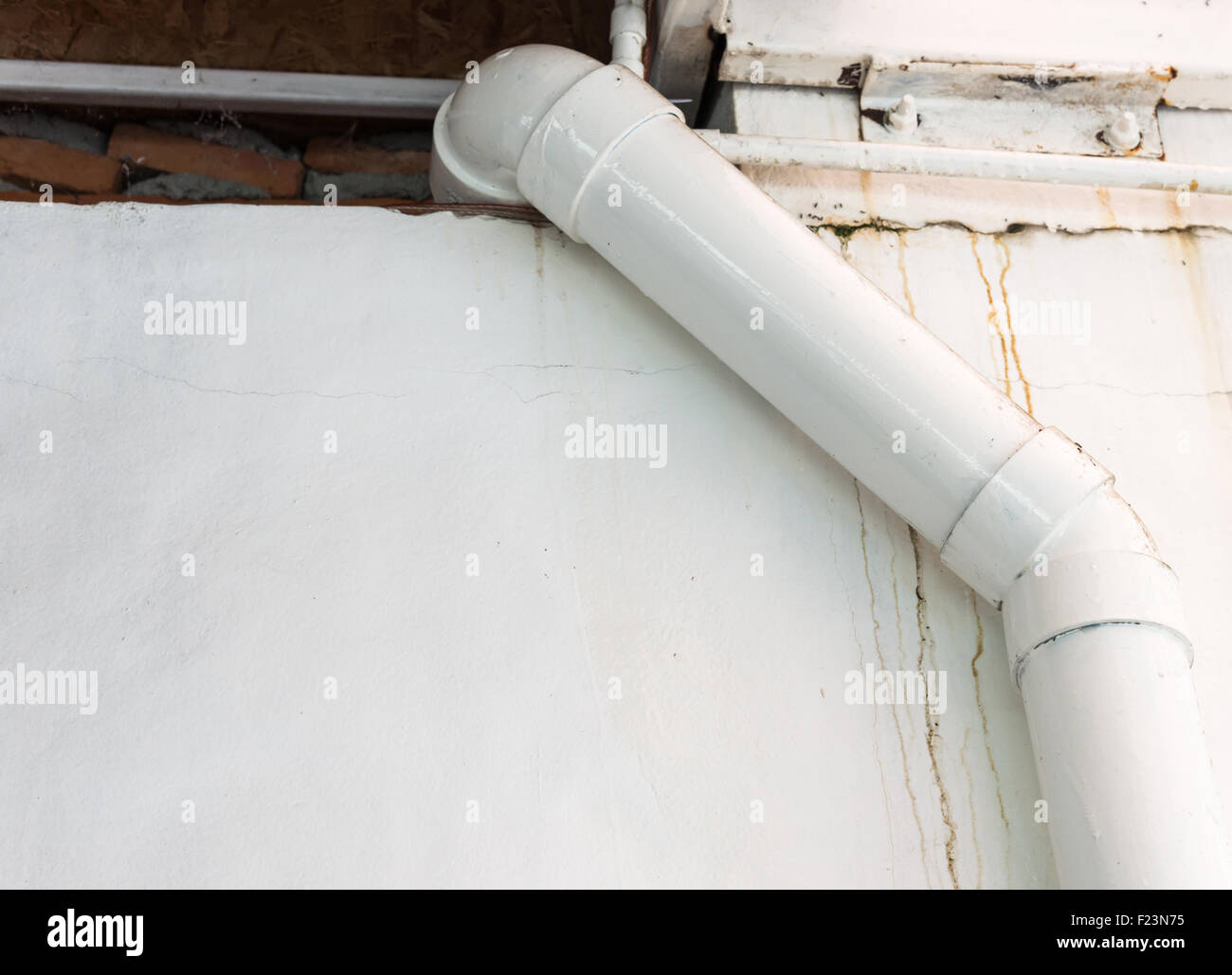 White drainage pipe on the factory wall Stock Photo - Alamy