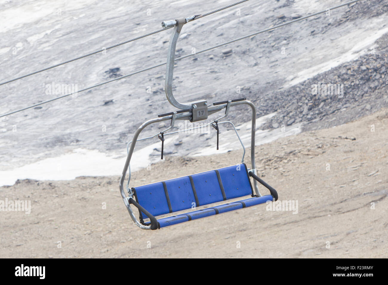 Empty ski lift above snow, mountains in Switzerland Stock Photo - Alamy