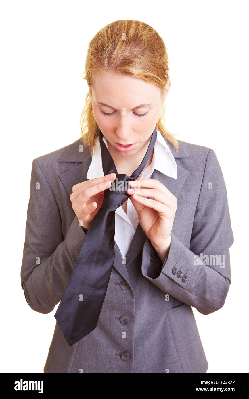 Blond business woman in a suit with a tie Stock Photo - Alamy