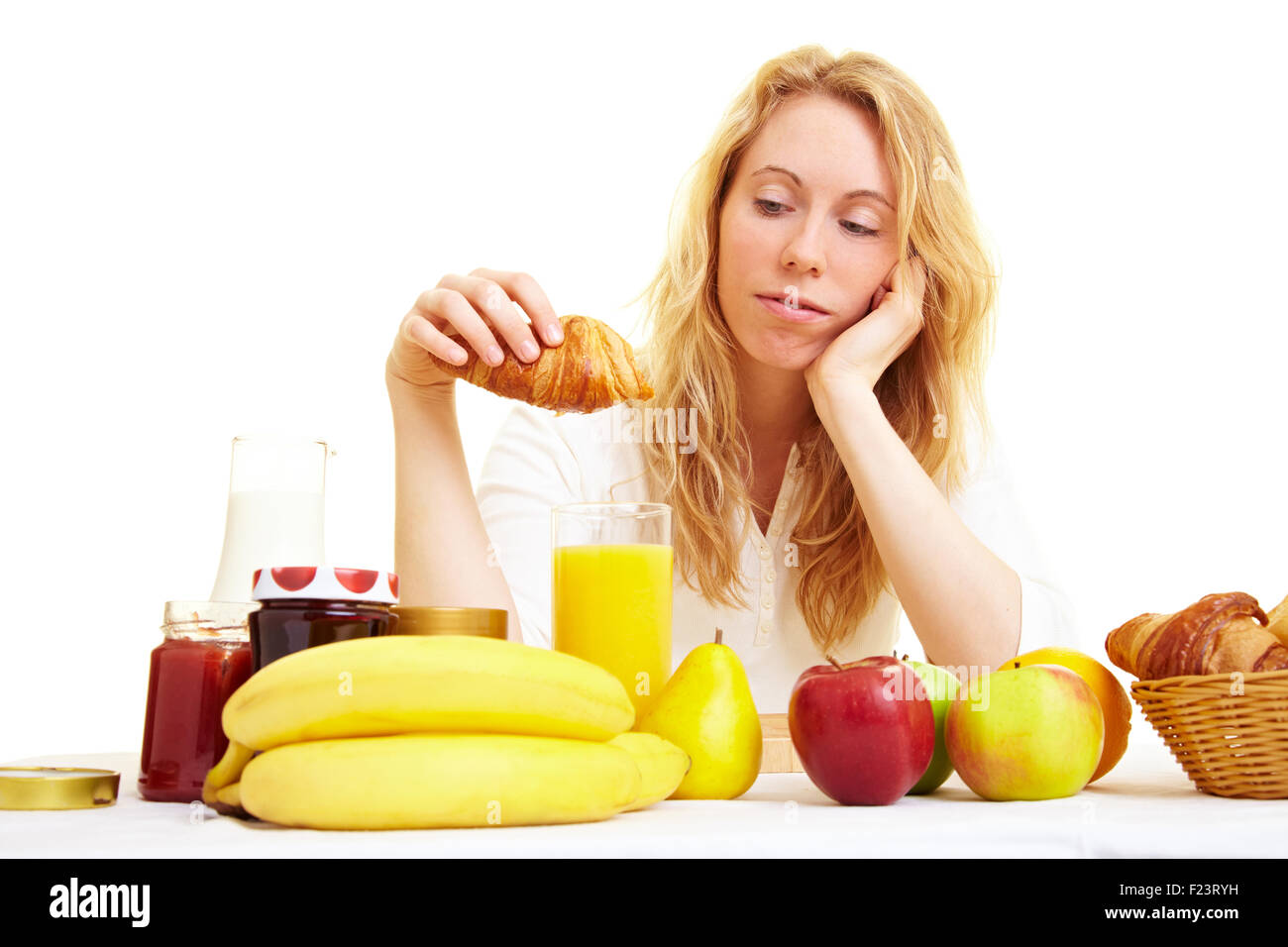 Woman in the morning at the breakfast table Stock Photo - Alamy