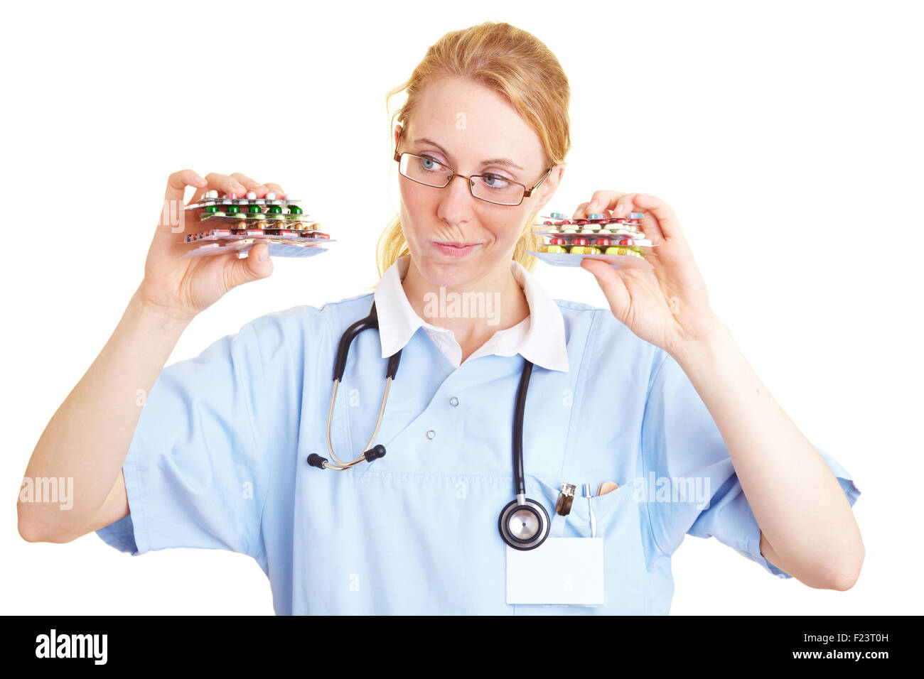 Nurse holding many colorful pills in her hands Stock Photo - Alamy