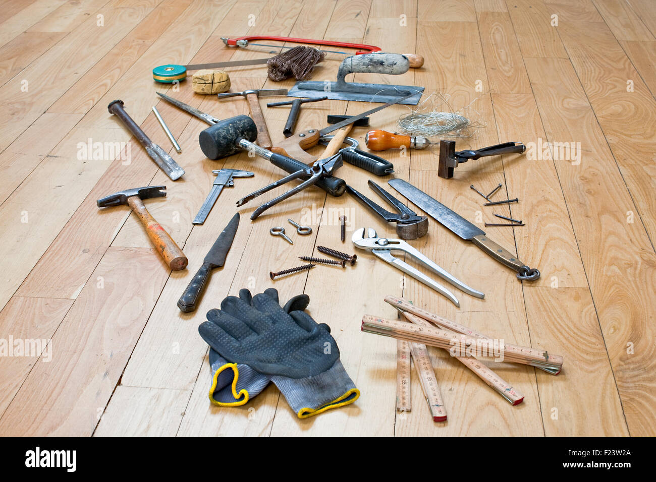 A lot of tools on wooden floor Stock Photo - Alamy