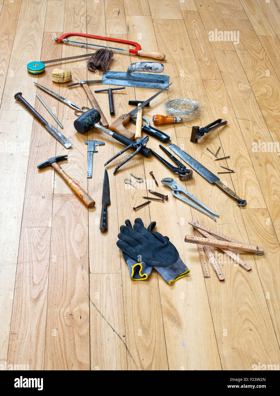 A lot of tools on wooden floor Stock Photo - Alamy
