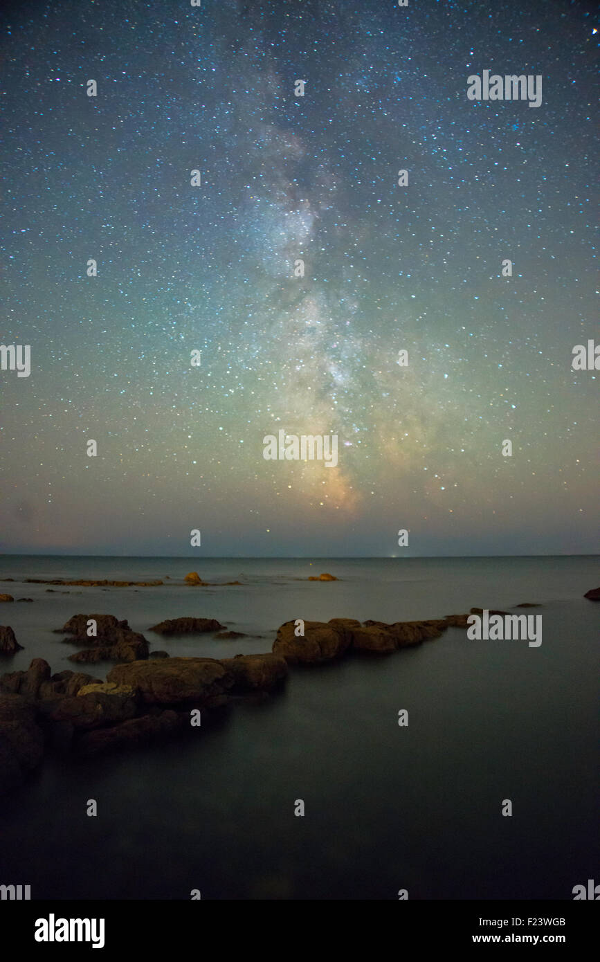 The Milkyway and night sky over the sea Stock Photo - Alamy