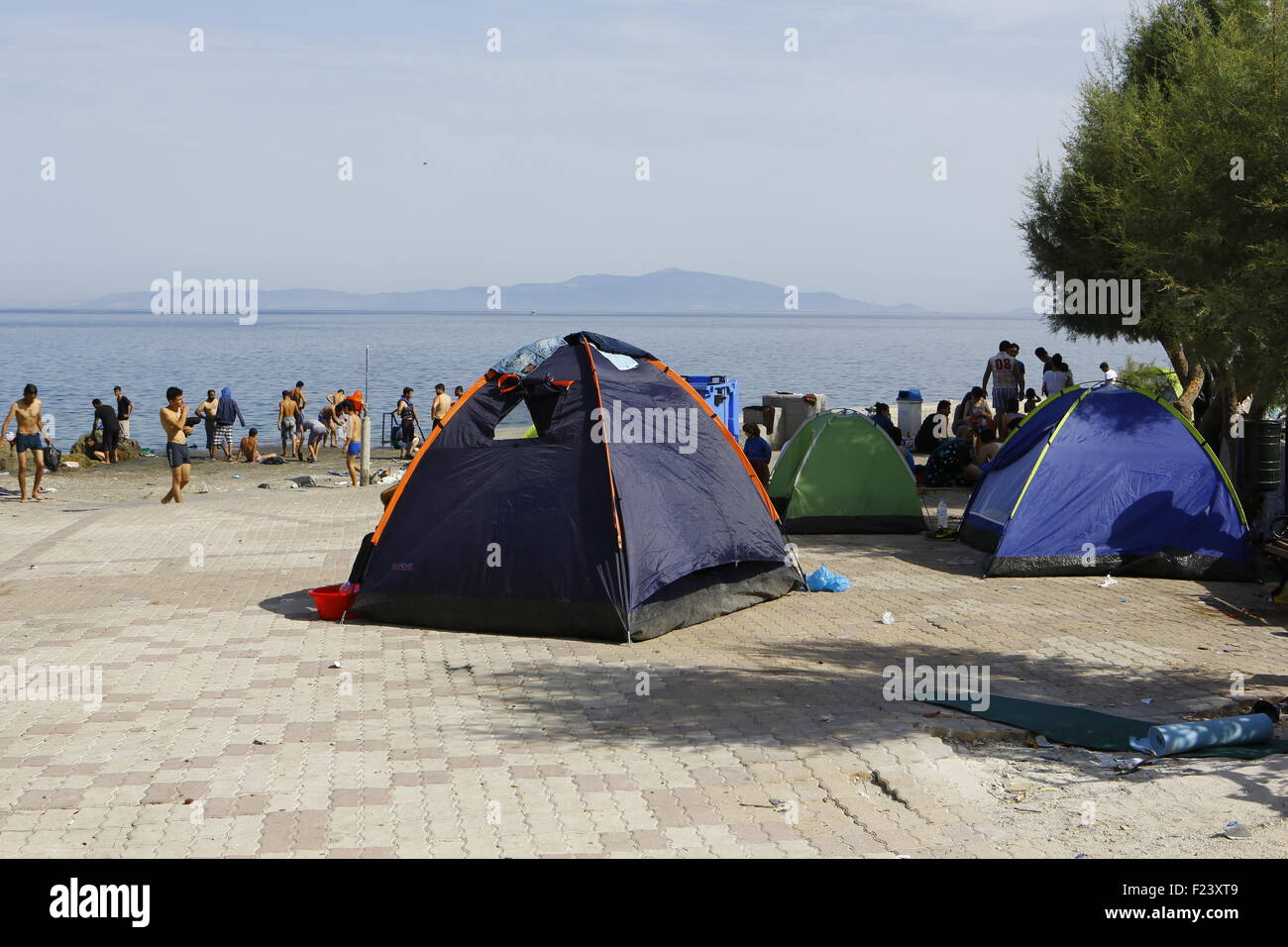 Refugees have pitched their tents in the harbor of Mytilene. Thousands ...