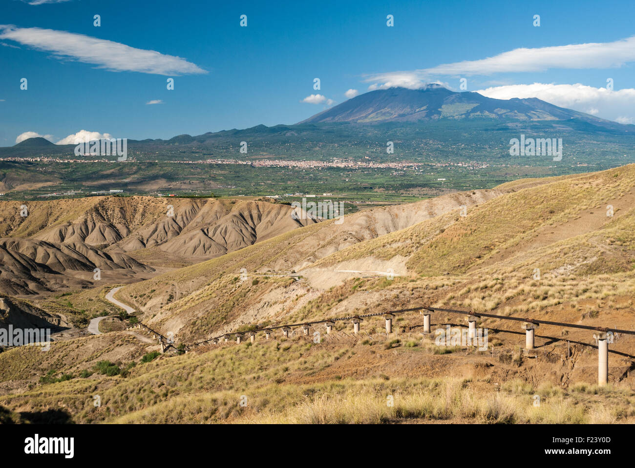 Badlands in the countryside of Sicily with volcano Etna in background ...