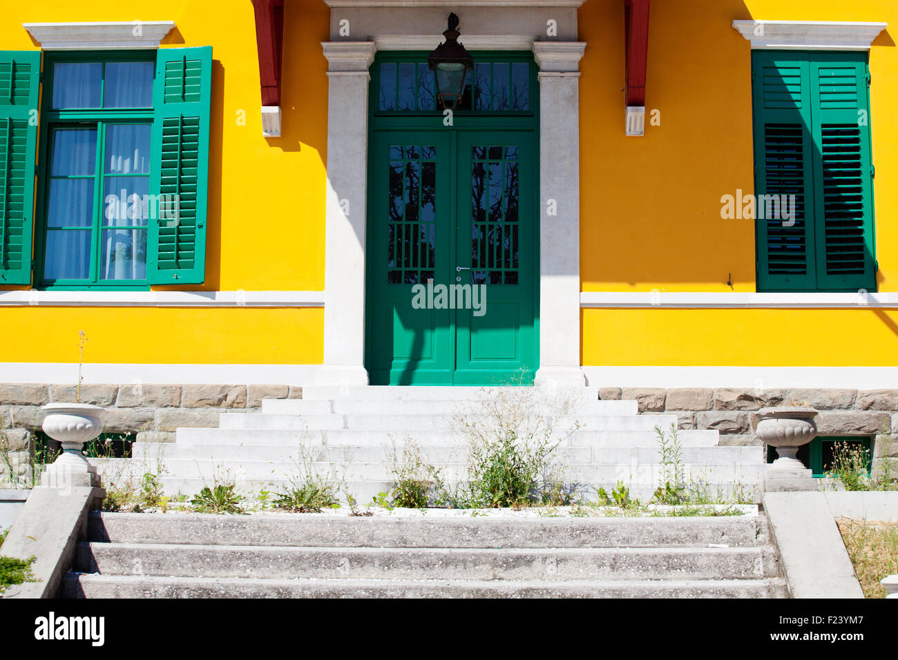 Yellow house in Trieste - Italy Stock Photo - Alamy