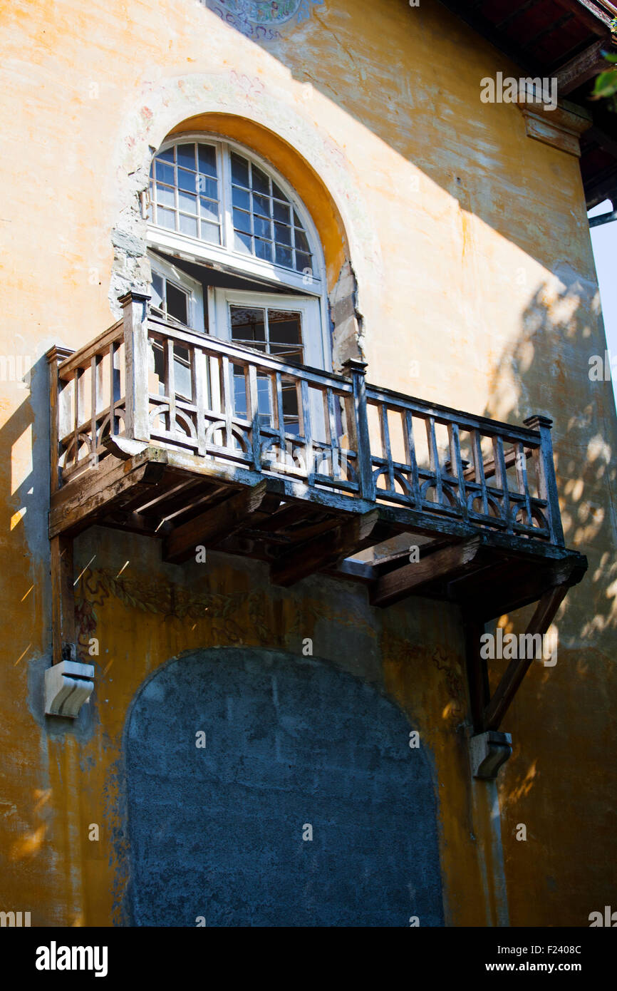 Wooden balcony in a old house Stock Photo - Alamy