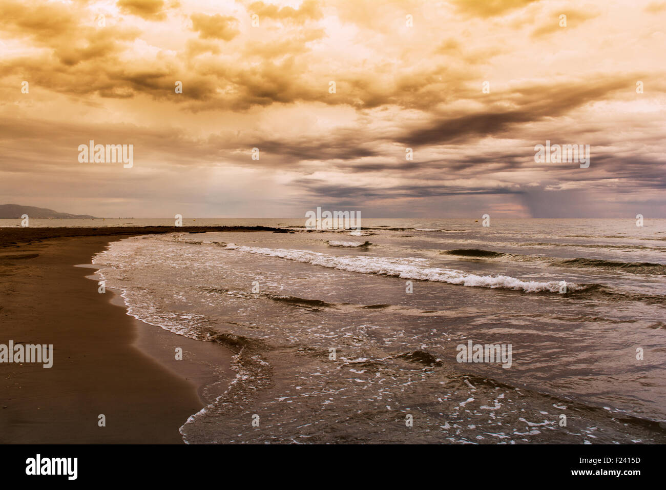 Sunrise on the beach in Spain Stock Photo - Alamy