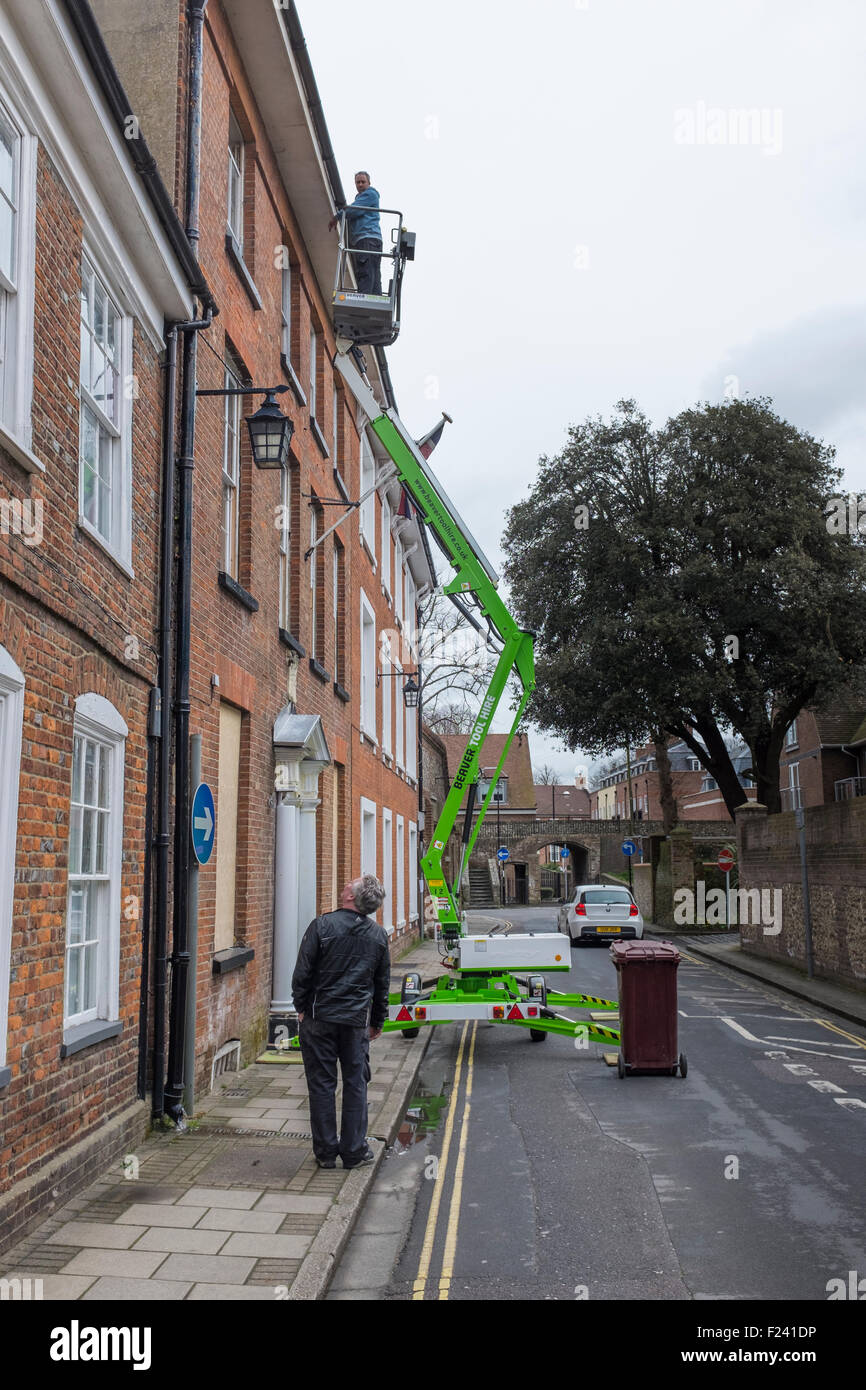 People up a cherry picker hi-res stock photography and images - Alamy