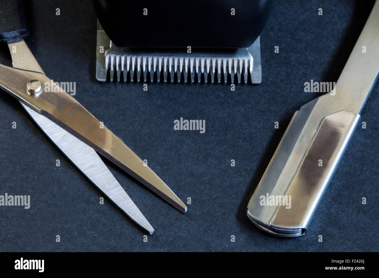 scissor cuts hair and razor Stock Photo - Alamy