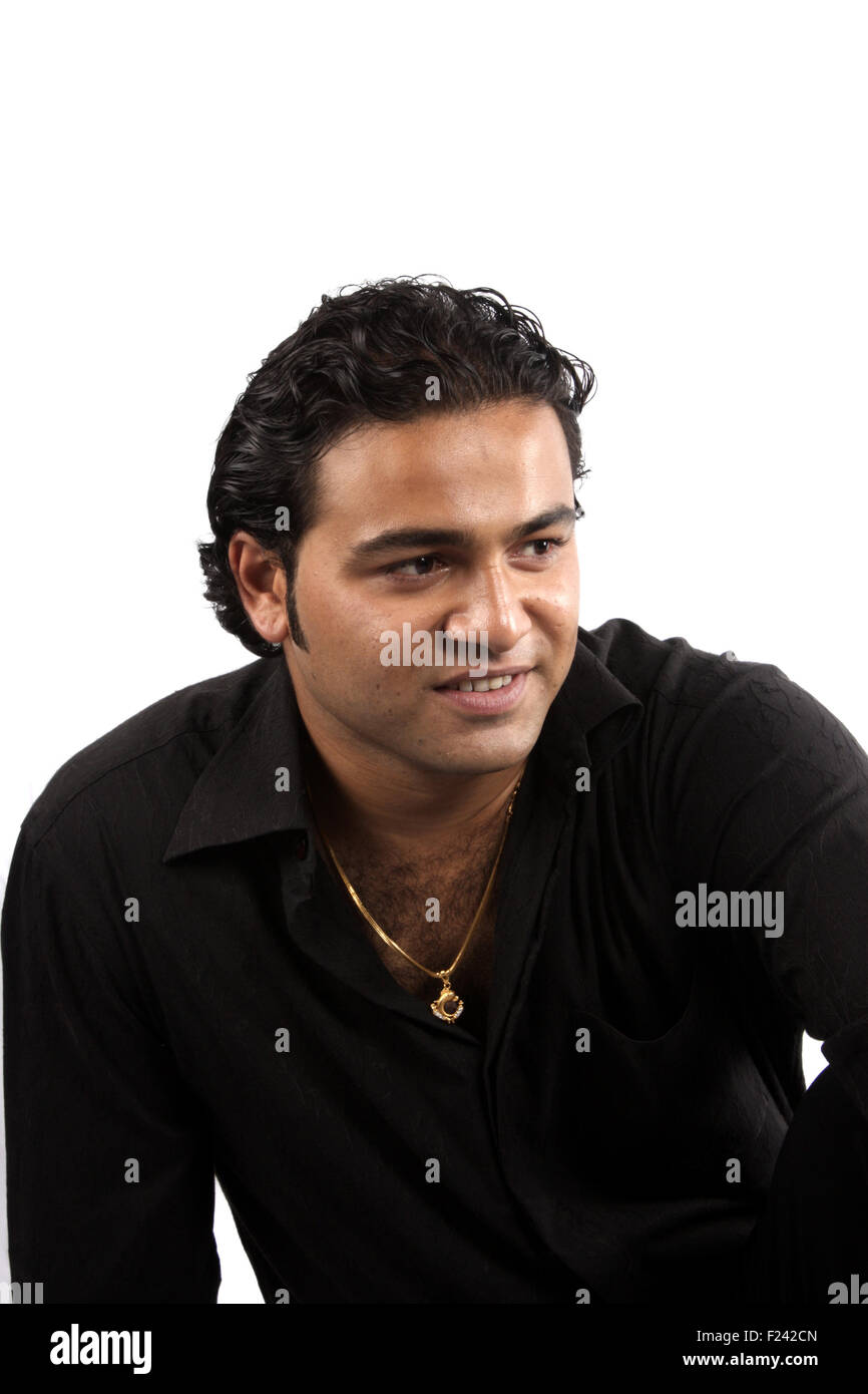 A portrait of a handsome Indian guy, on white studio background Stock ...