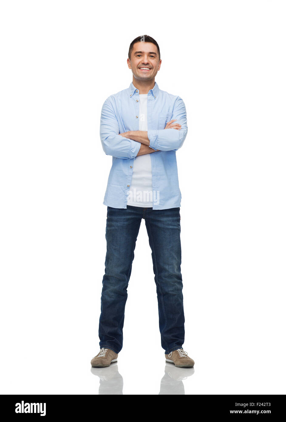 smiling man with crossed arms Stock Photo - Alamy
