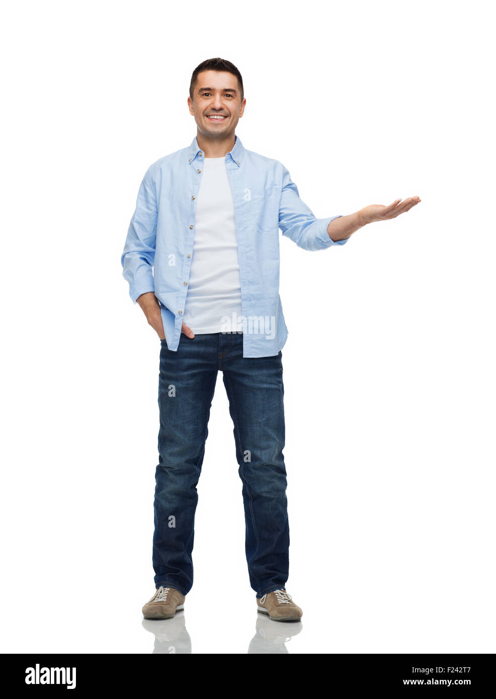 Businessman holding showing something isolated hi-res stock photography ...