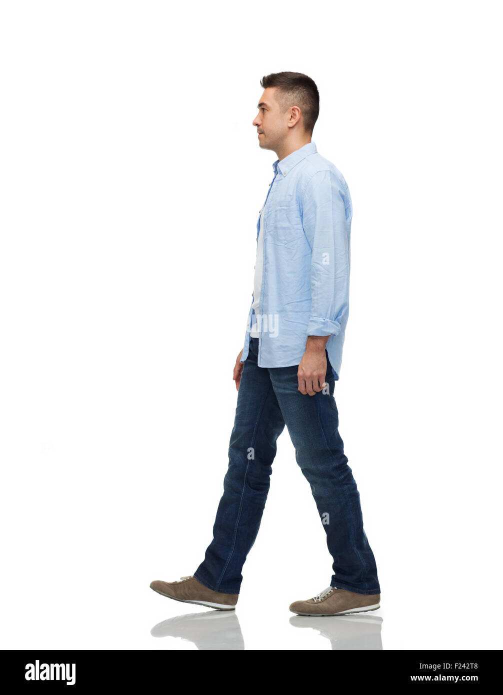 Man walking side view Cut Out Stock Images & Pictures - Alamy