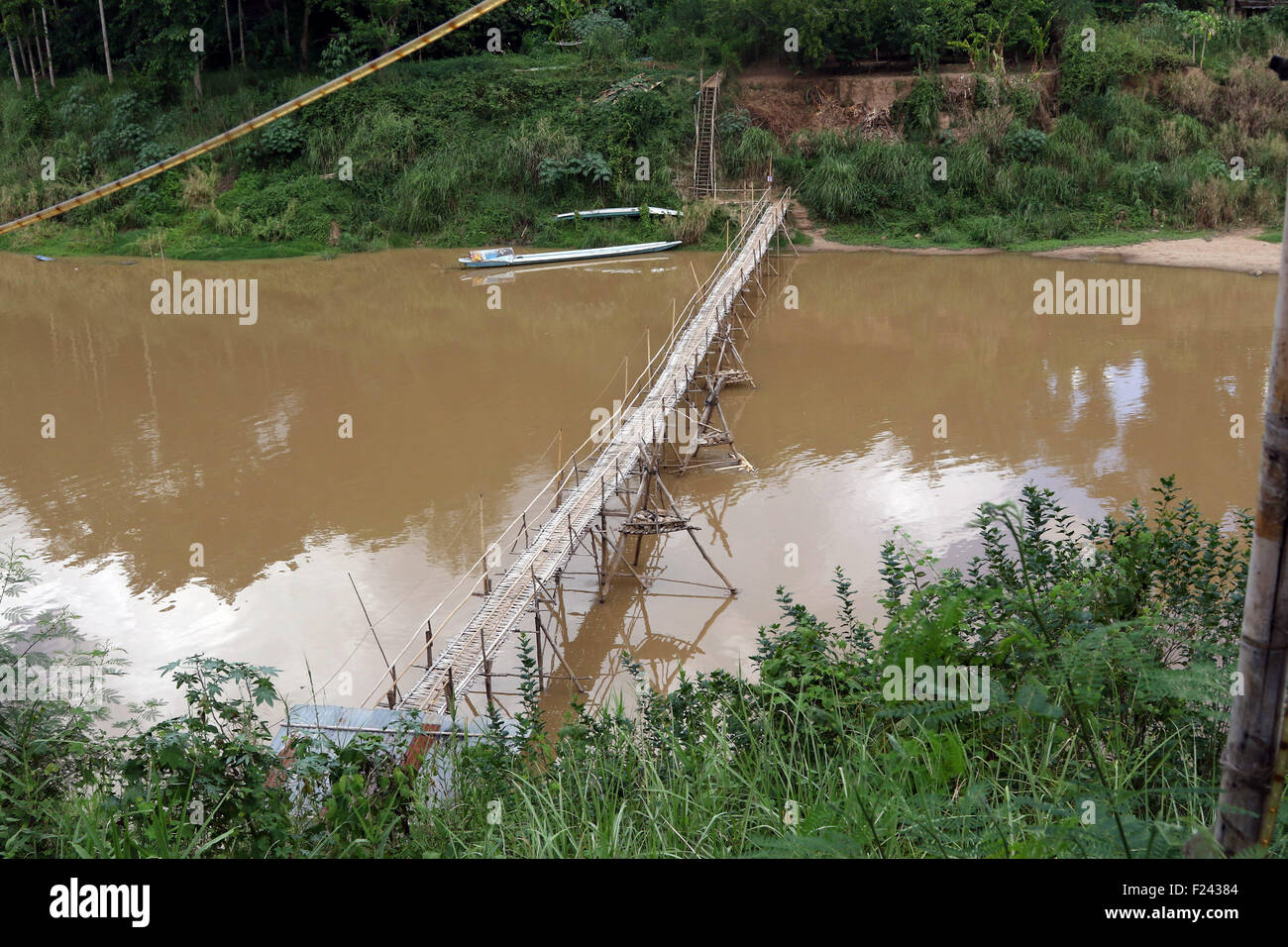 rickety bamboo bridge before storm damage knocked it down the next day ...