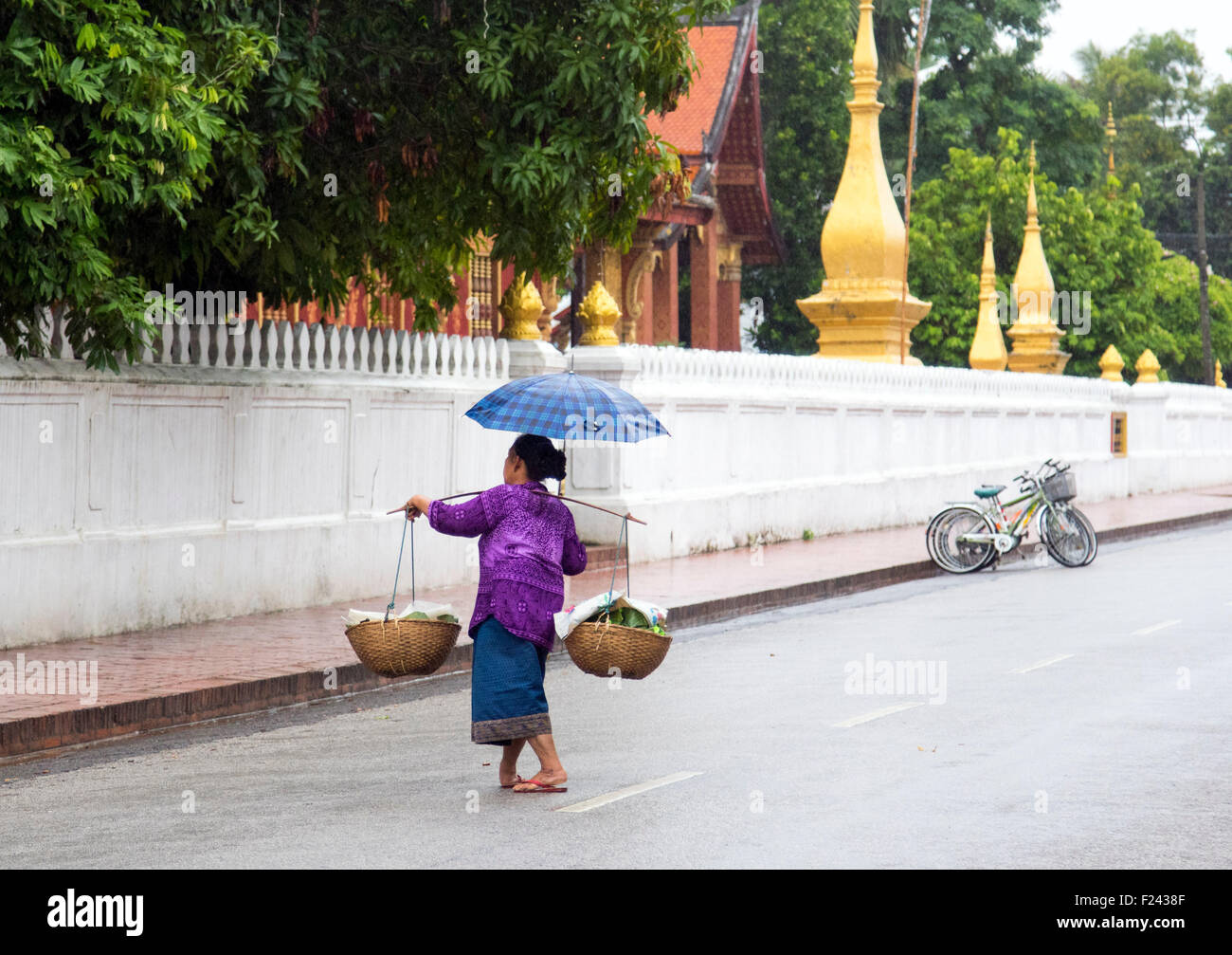 carrying pole shoulder pole milkmaid's yoke woman Stock Photo - Alamy