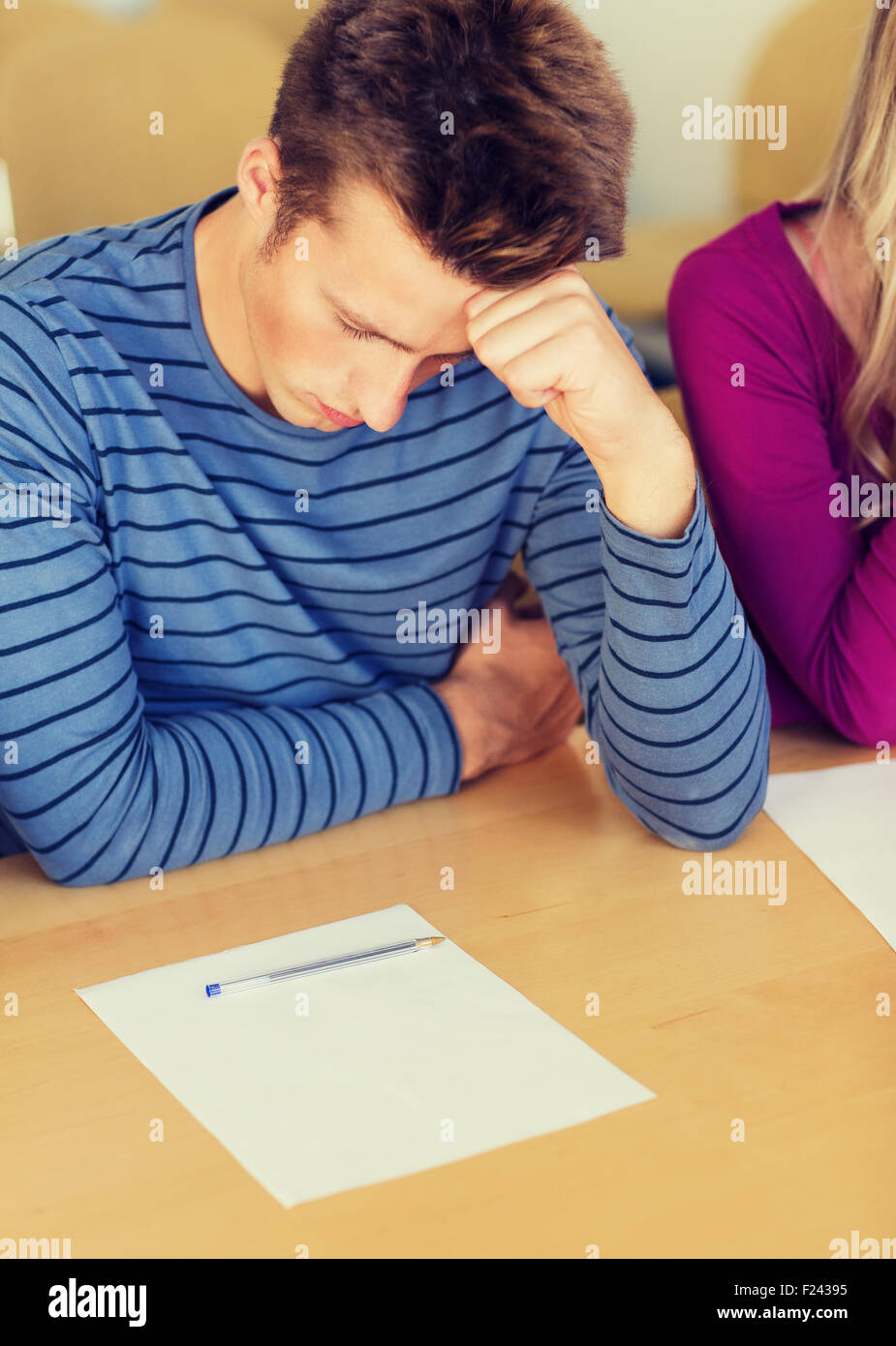 group of students with papers Stock Photo - Alamy