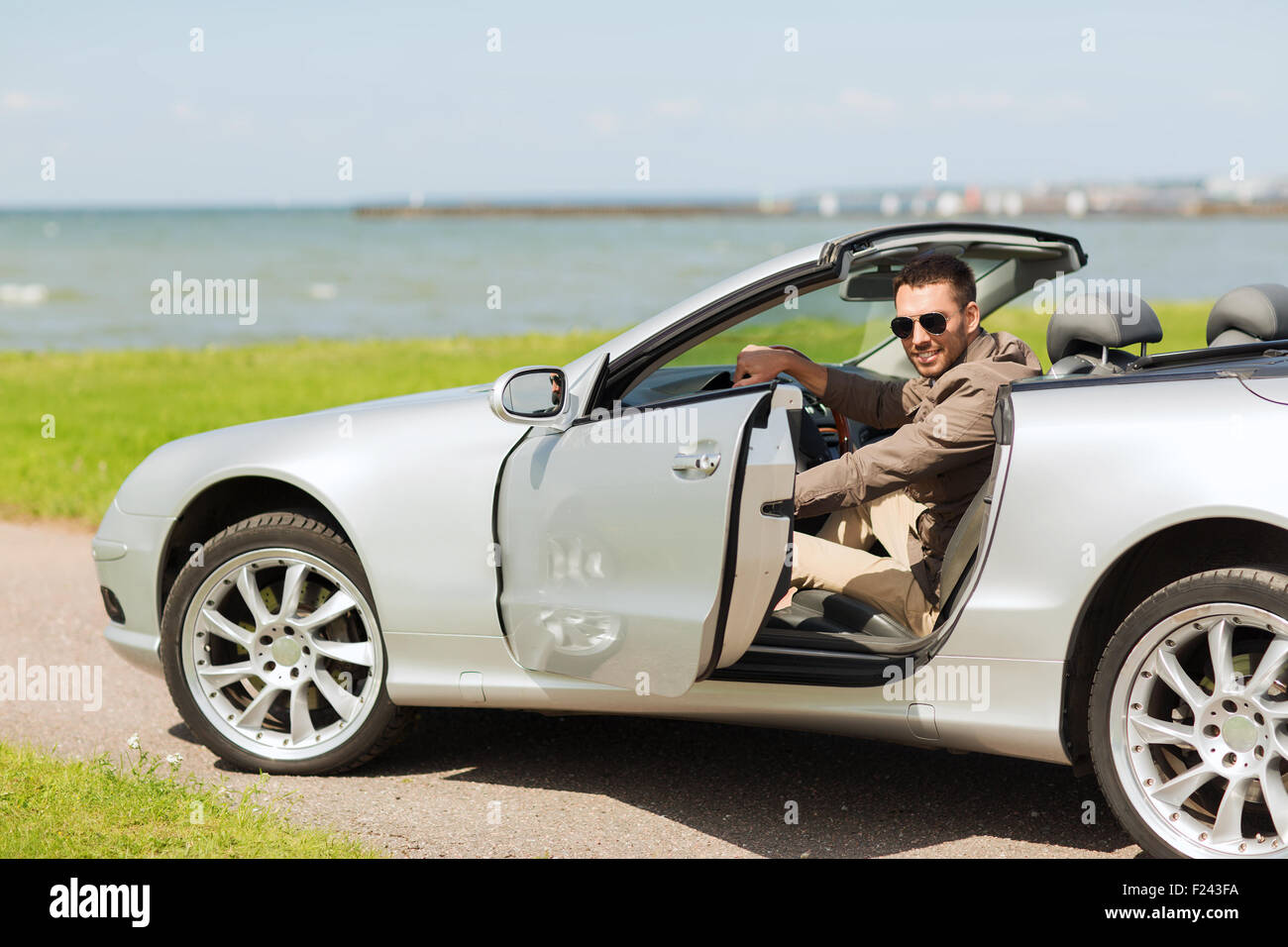 Driver opening car door hi-res stock photography and images - Alamy