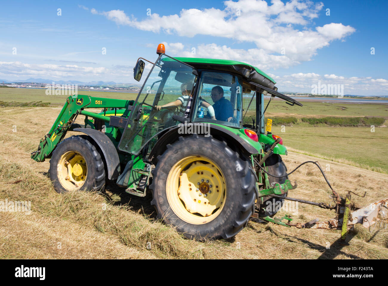 Farmer harvesting hay hi-res stock photography and images - Alamy