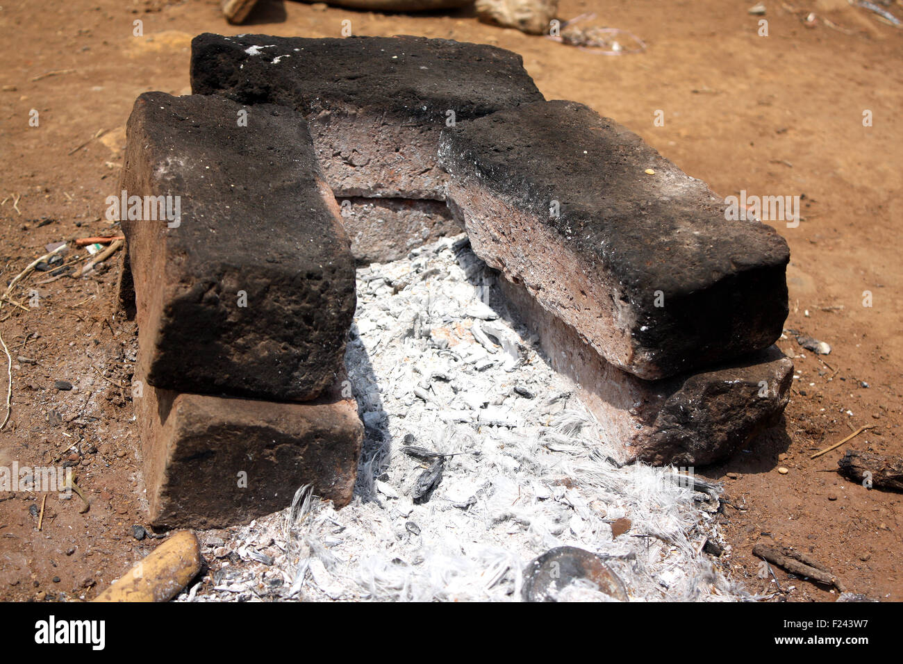 A stove for cooking food made of bricks, in a poor Indian house Stock ...