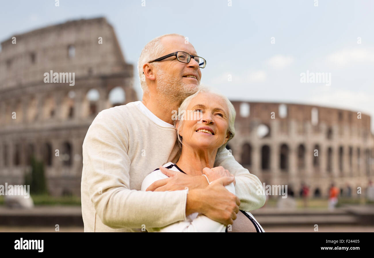 happy senior couple over coliseum in rome, italy Stock Photo - Alamy