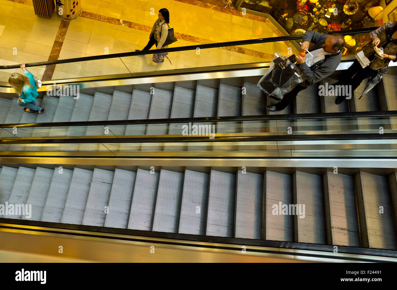 people on escalators Stock Photo - Alamy