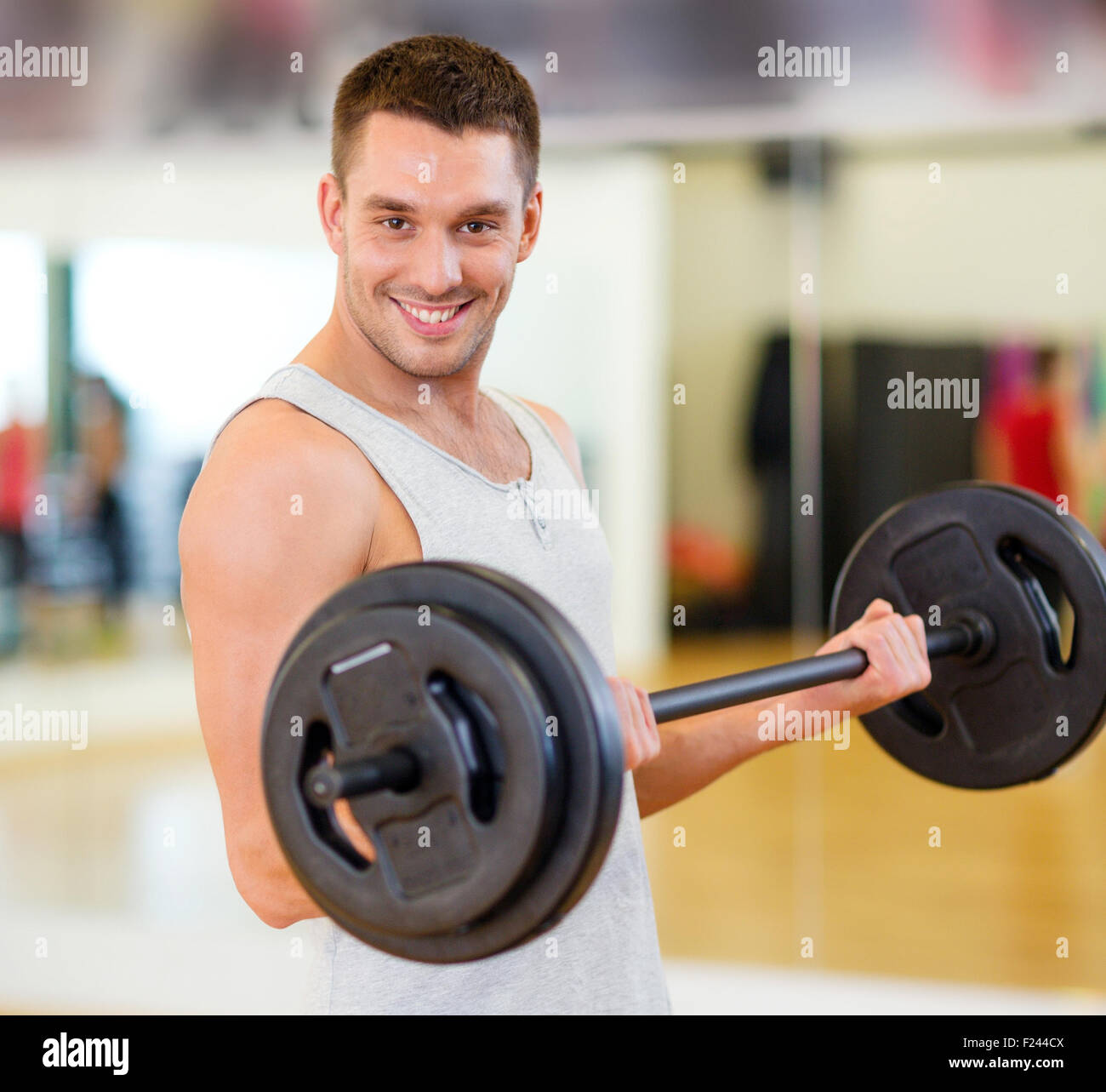 Hispanic man lift barbell gym hi-res stock photography and images - Alamy