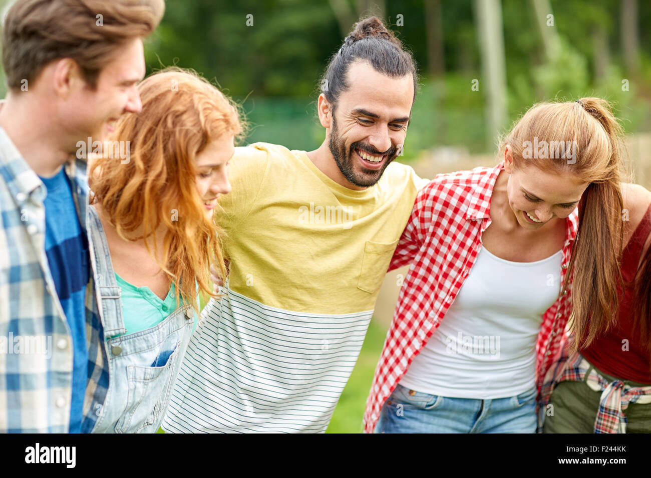 group of smiling friends outdoors Stock Photo - Alamy