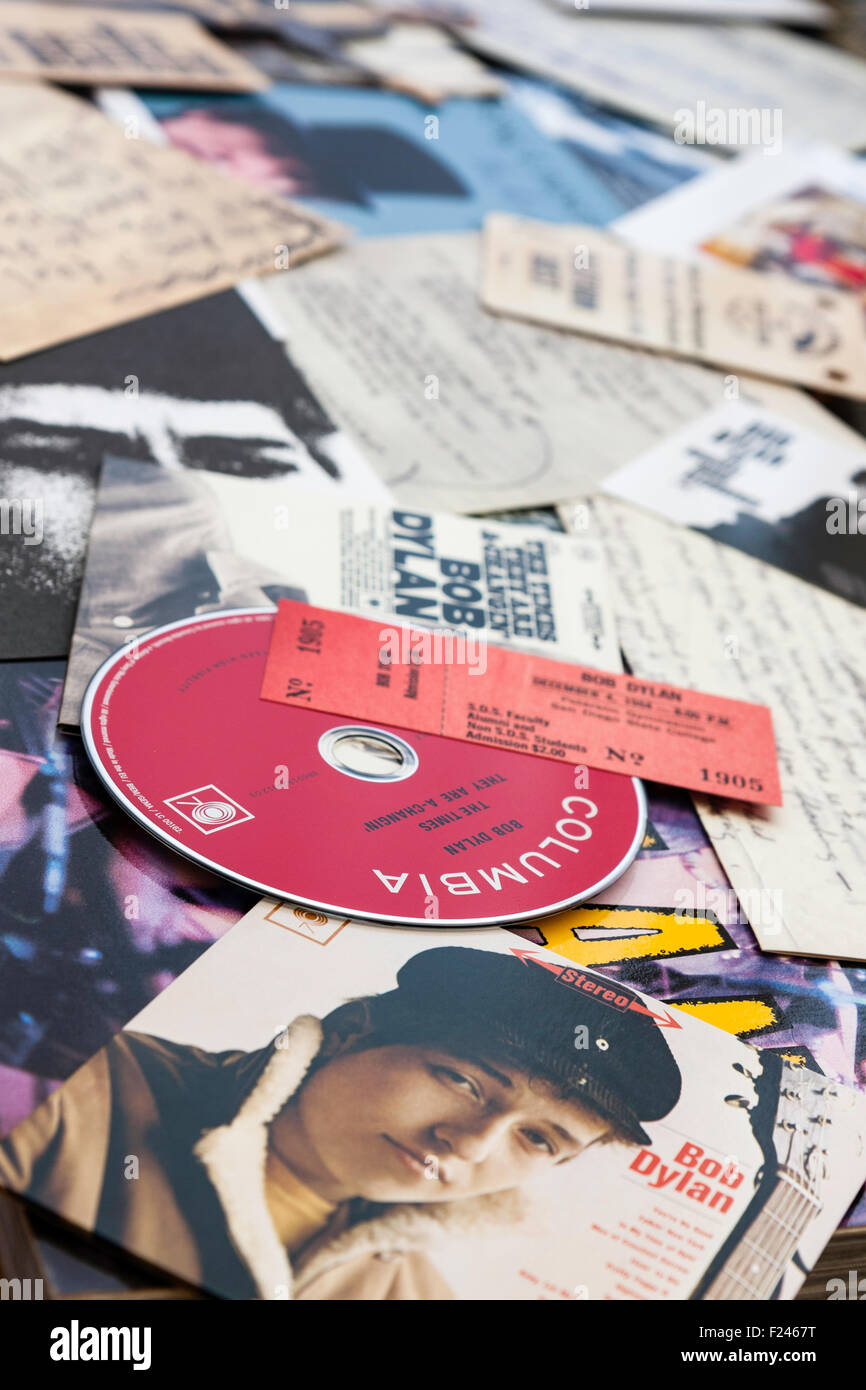 Bob Dylan memorabilia. Scattered display of tickets, books, CD and CD ...