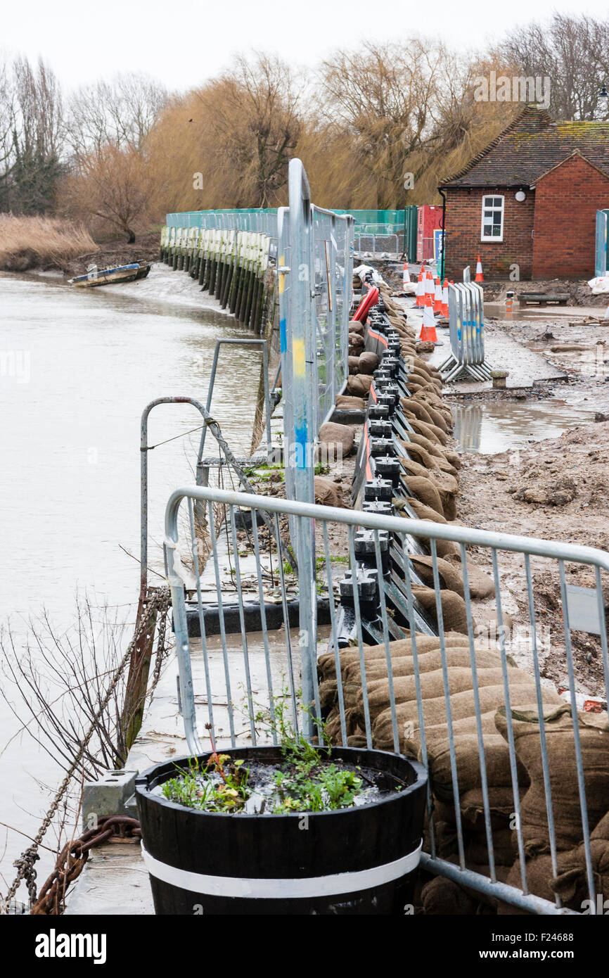 Emergency urgent flood defences being constructed along the quay at ...