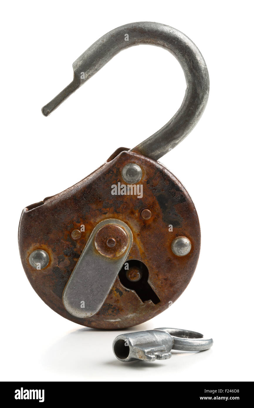Old rusty padlock with open latch and key on white background Stock ...