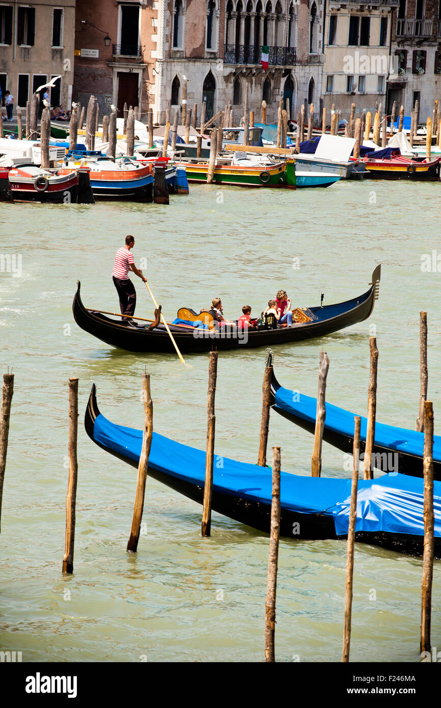 Gondolas parking traditional Venetian rowing boat in Italy Stock Photo ...