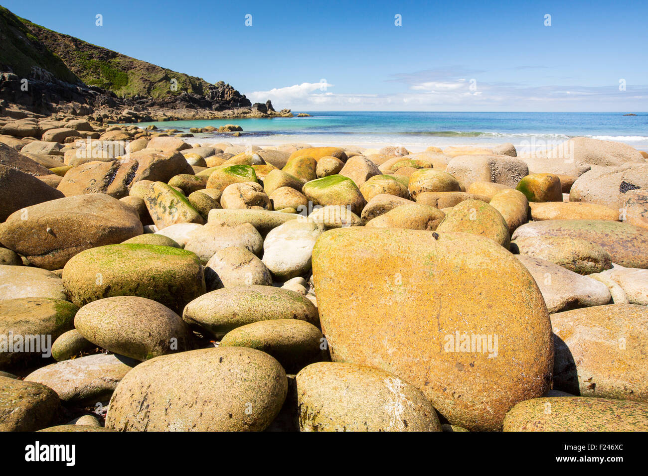 Weathered granite boulders on the beach at Porthmeor Cove, on Cornwall ...