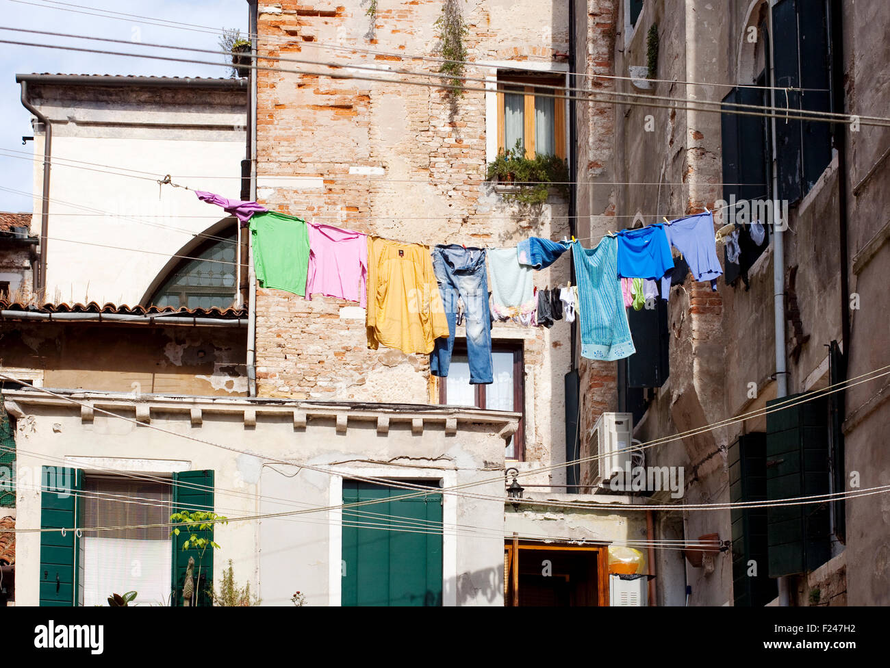 Clothes line hanging italy hi-res stock photography and images - Alamy