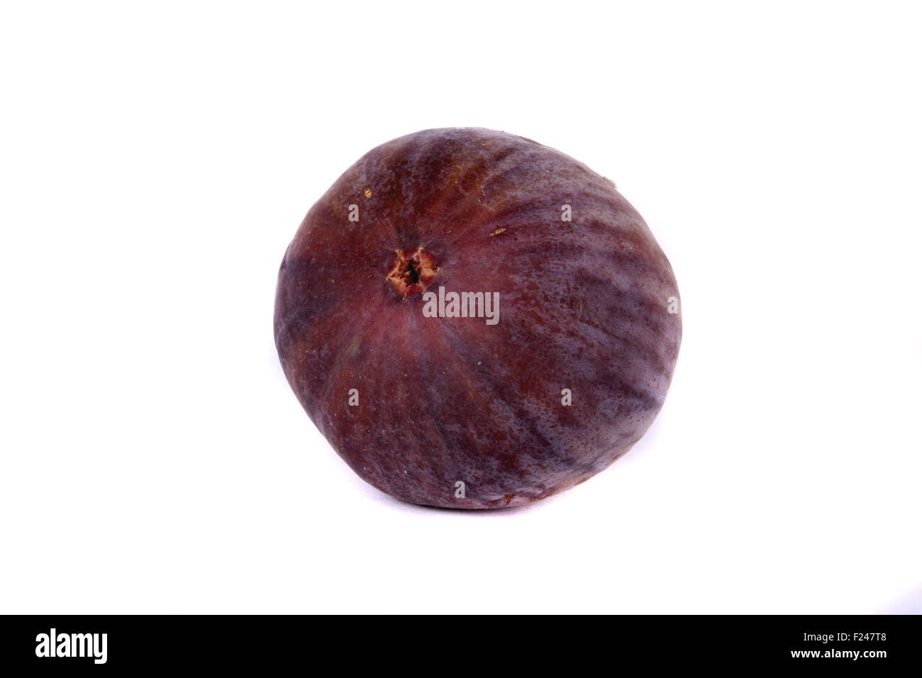 A fig fruit, isolated on white studio background Stock Photo - Alamy
