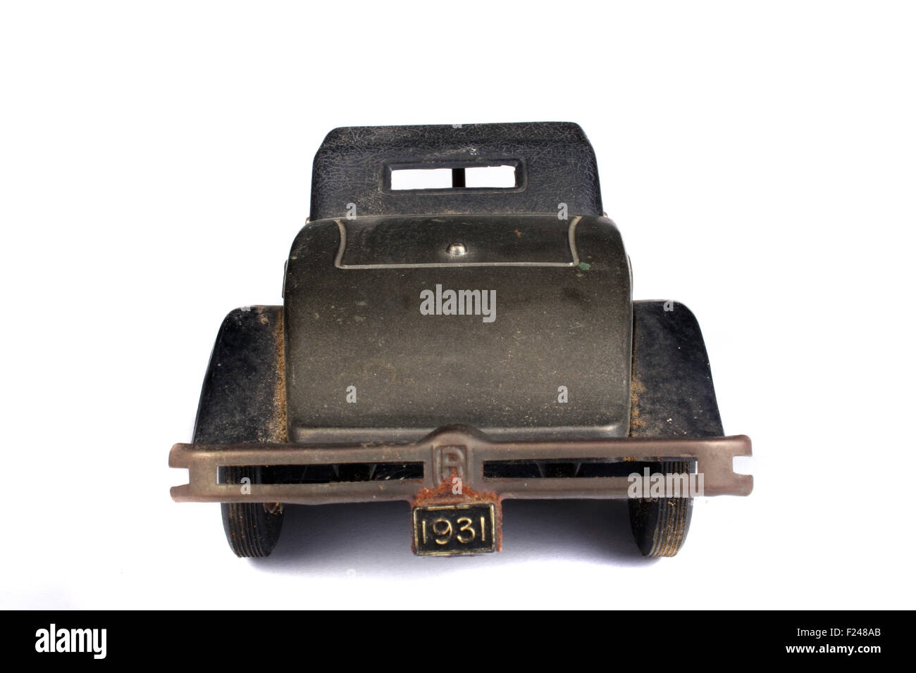 A rear view of a antique vintage car, on white studio background Stock ...