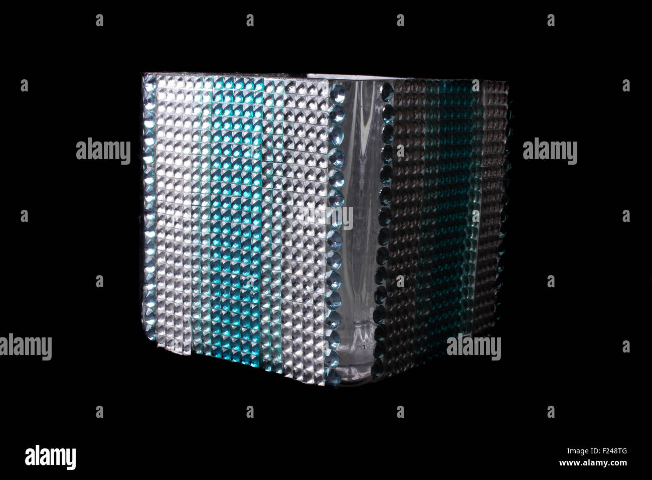 A tissue holder box studded with gems and glass beads, isolated on ...