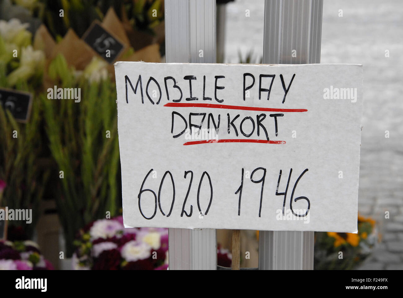 Copenhagen, Denmark. 11th September, 2015. Mobilepay at flowers vendor ...