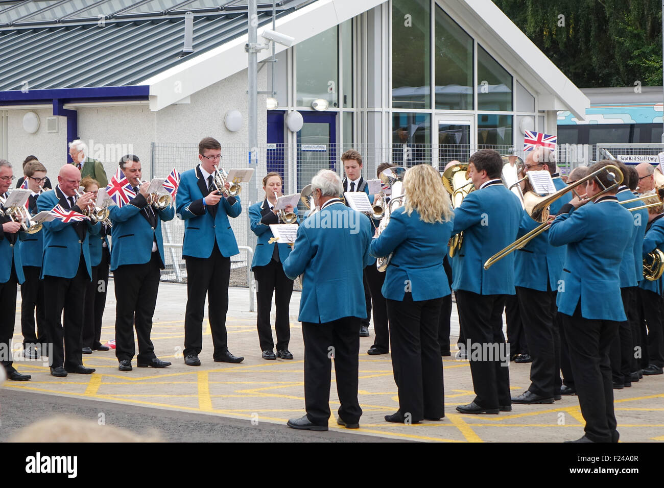 Brass Band playing at Tweedbank Station waiting for Queen to officially ...