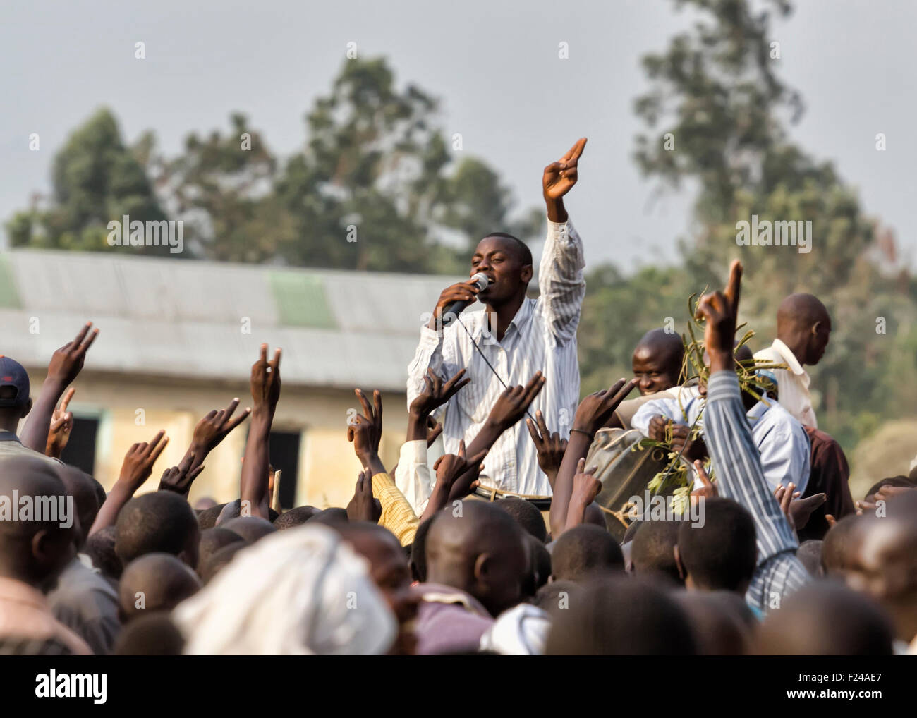 Young activist speaking at an opposition rally during the Ugandan ...