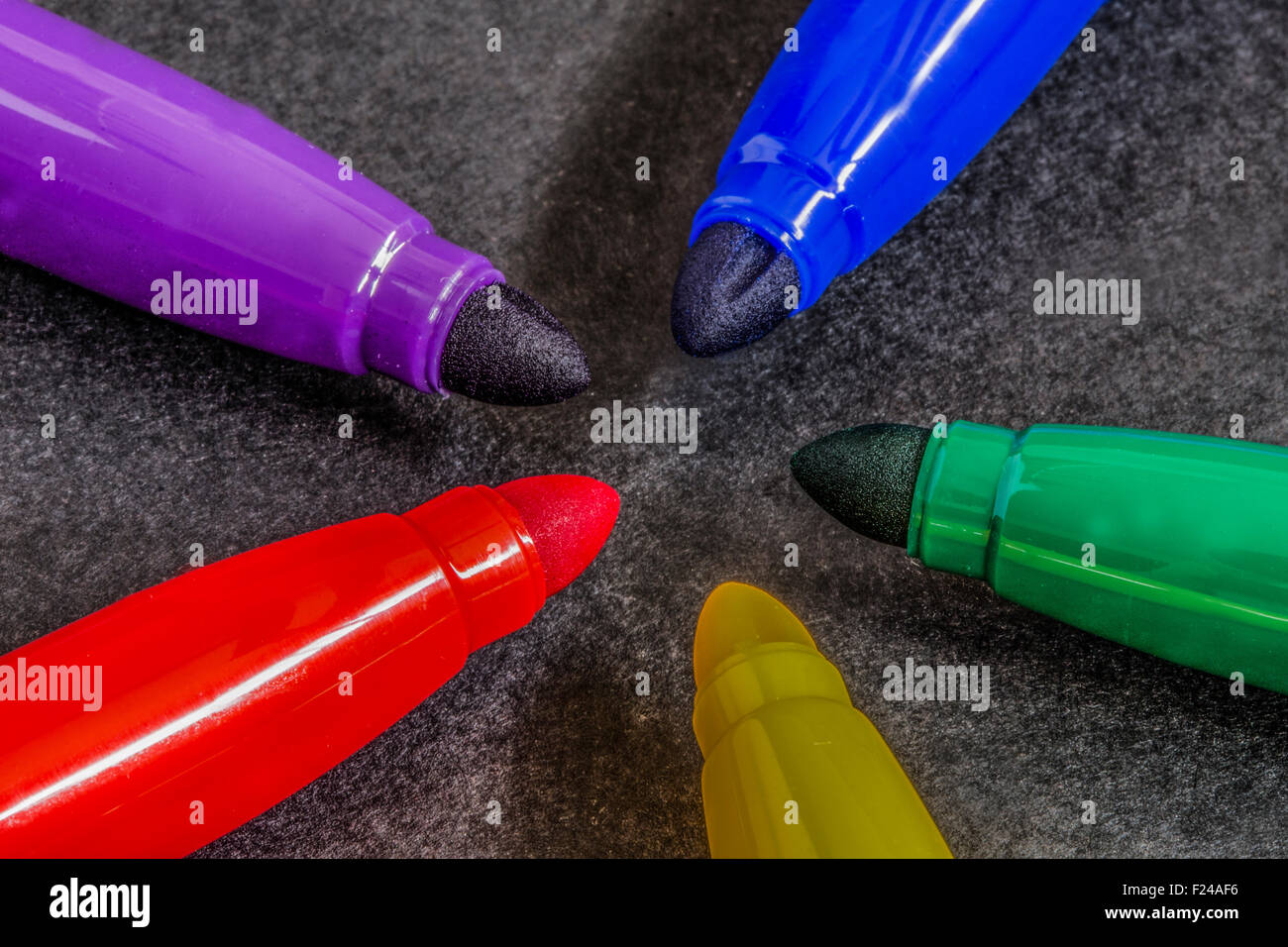 Children with pens hi-res stock photography and images - Alamy